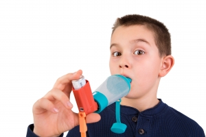Kid using Inhaler with Spacer - Bronchiectasis